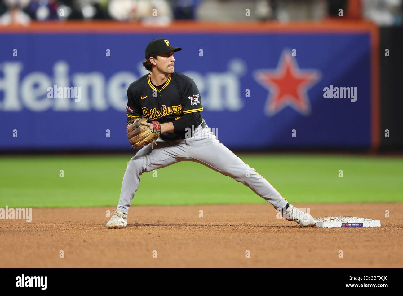 Pittsburgh Pirates 2B Adam Frazier #26 takes the throw, step on bag and ...