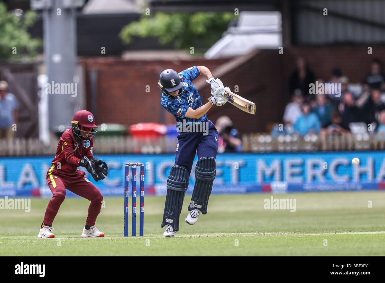 Derby, UK. 30th May, 2025. Amy Jones of England hits the ball for two ...