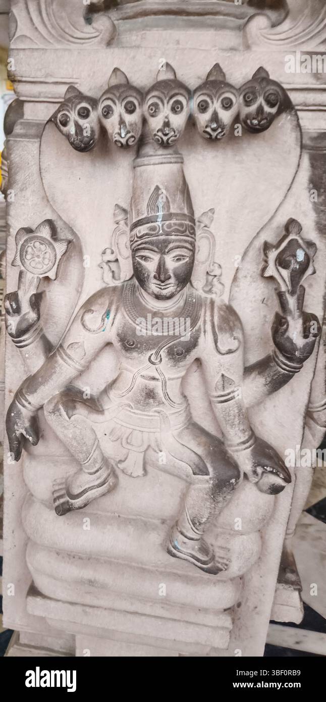 Carvings of ancient stone sculpture of indian god lord vishnu at the ...