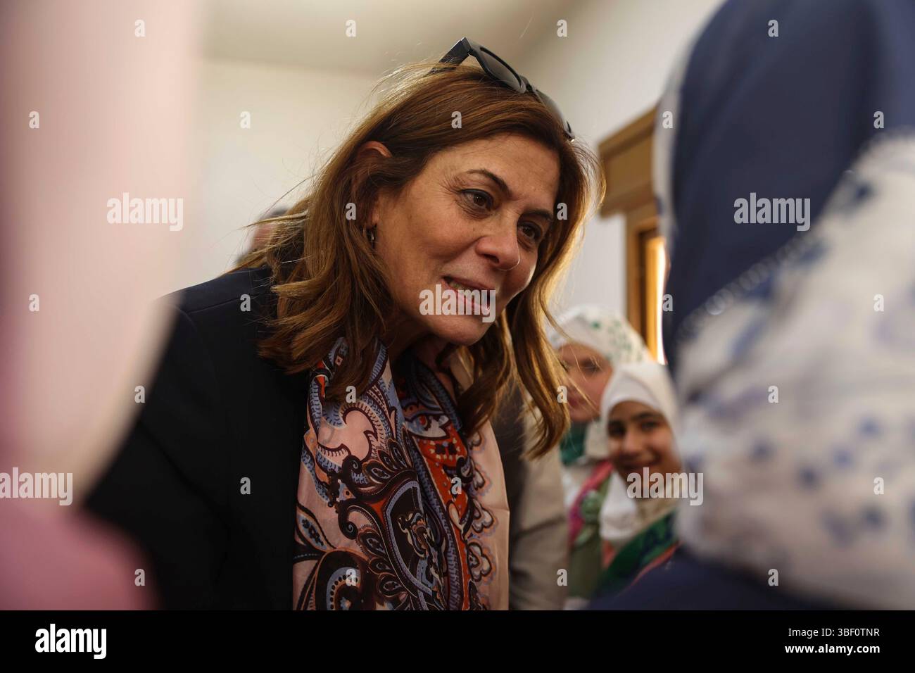 Syrian Minister of Social Affairs and Labor Hind Kabawat, speaks with ...