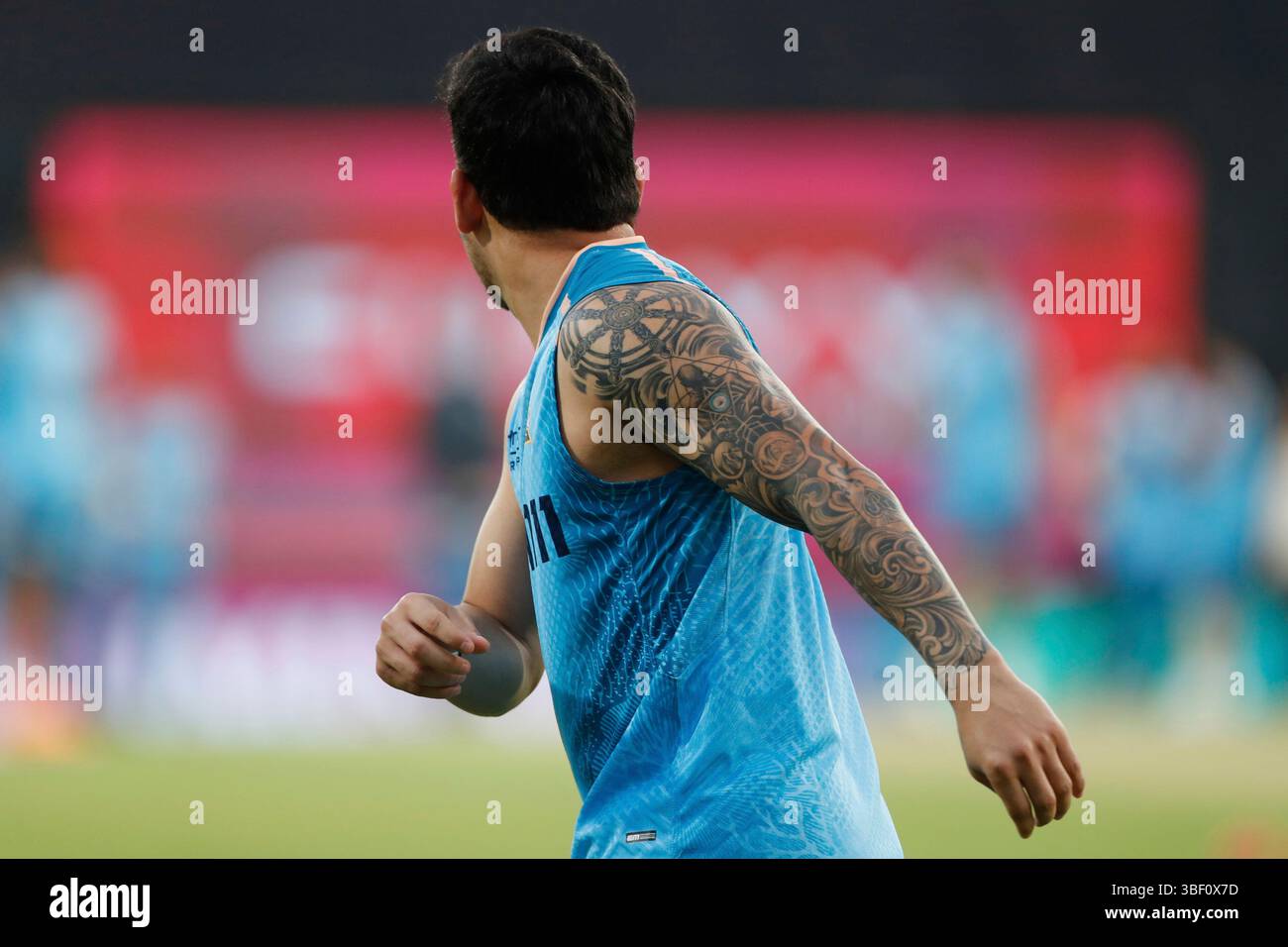 Tattooed arm of Gujarat Titans' Anuj Rawat is seen as he trains ahead ...