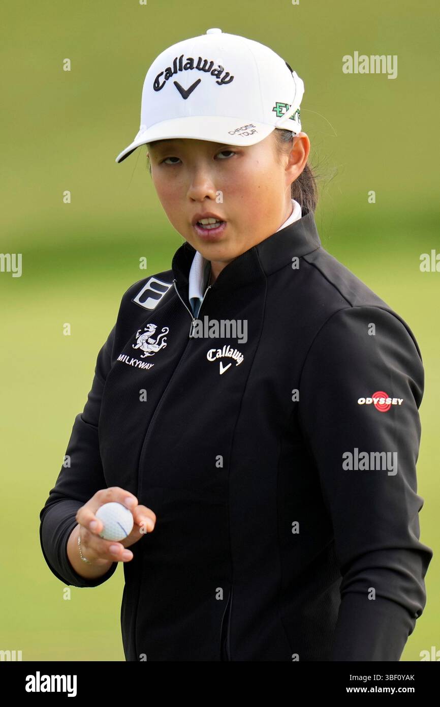 Ruoning Yin, of China, after her putt on the11th hole during the second ...