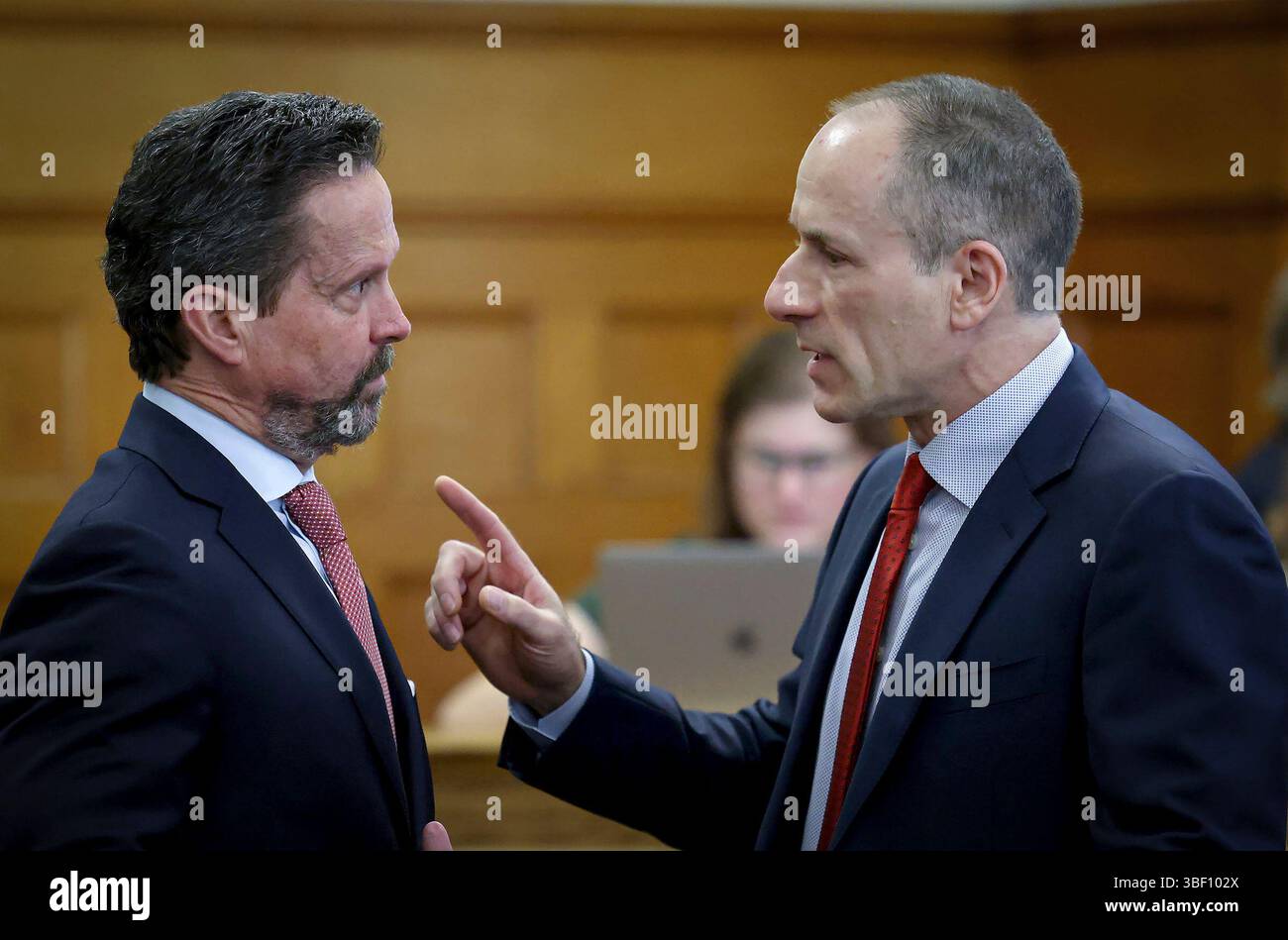 Defense attorneys Alan Jackson, left, and David Yannetti, right, confer ...