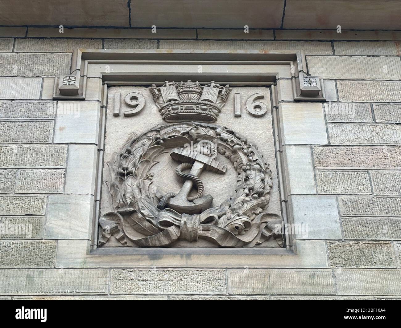 Stone engraving of an anchor and the year 1916 at Admiralty House near ...