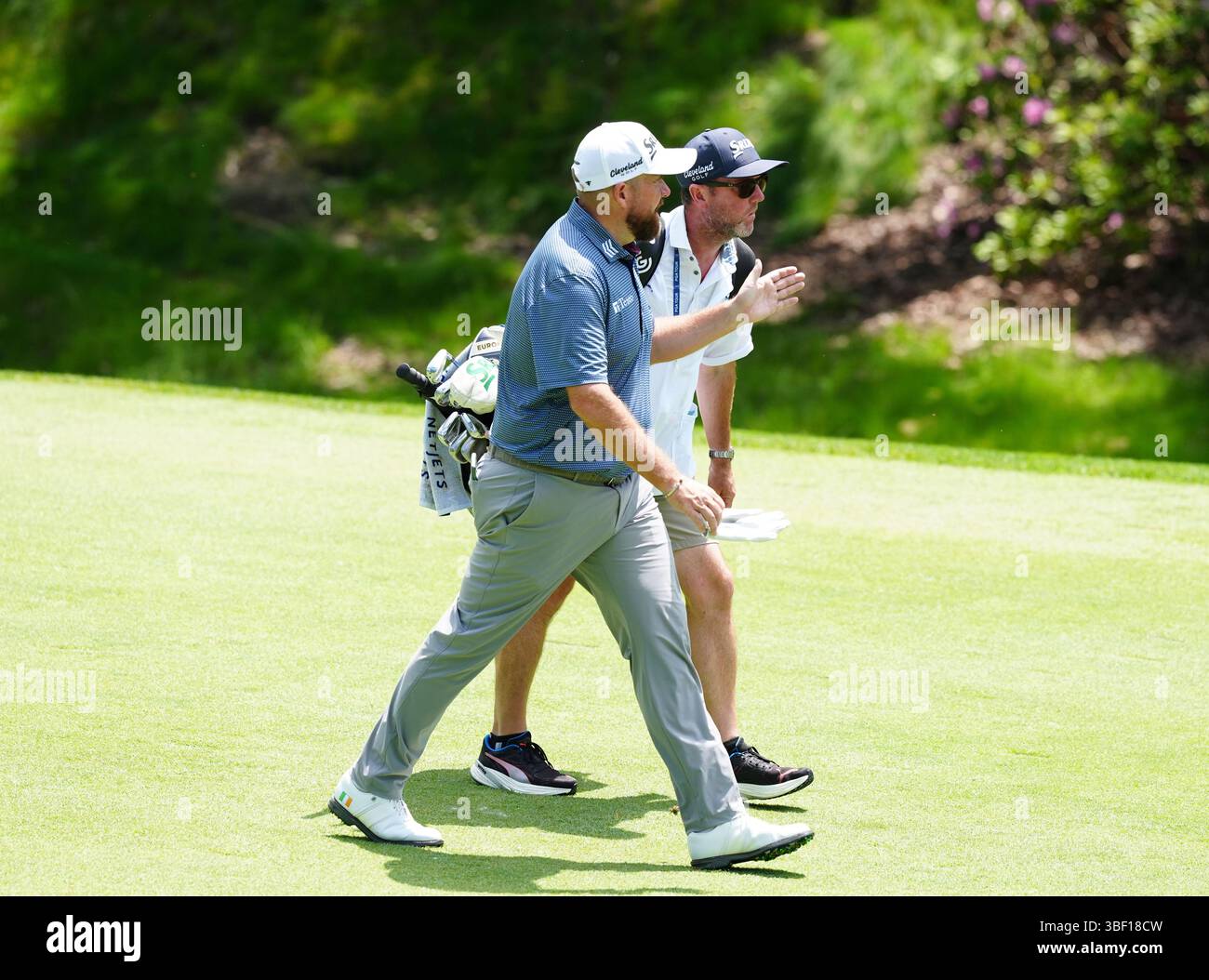 DUBLIN, OH - MAY 29: PGA golfer Shane Lowry talks to his caddie while ...