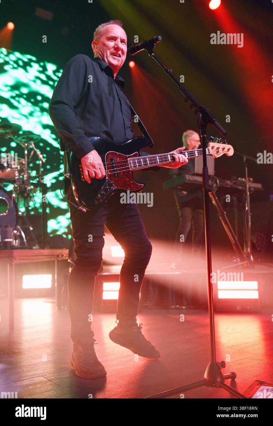 Andy McCluskey on stage for Orchestral Manoeuvres in the Dark (OMD) in ...