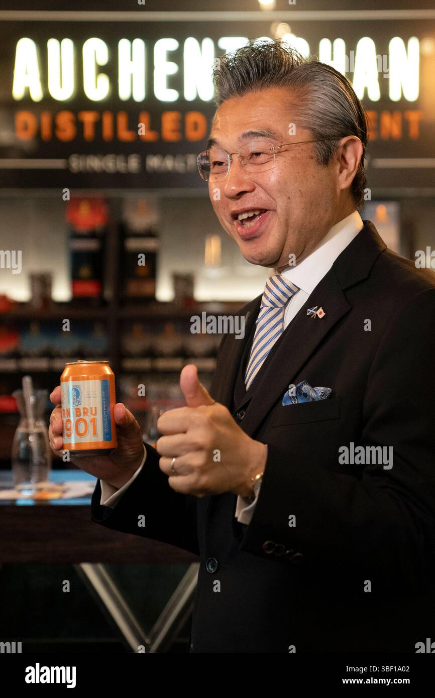 The Japanese Ambassador to the UK, Hiroshi Suzuki, tastes some ...