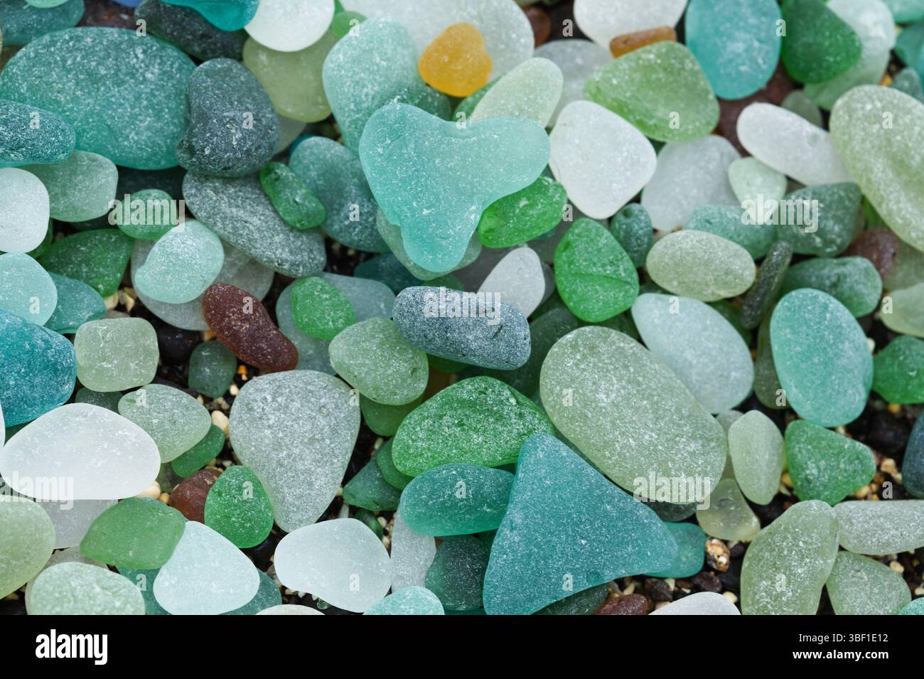 sea glass pebbles of many colors, glass beach background Stock Photo ...