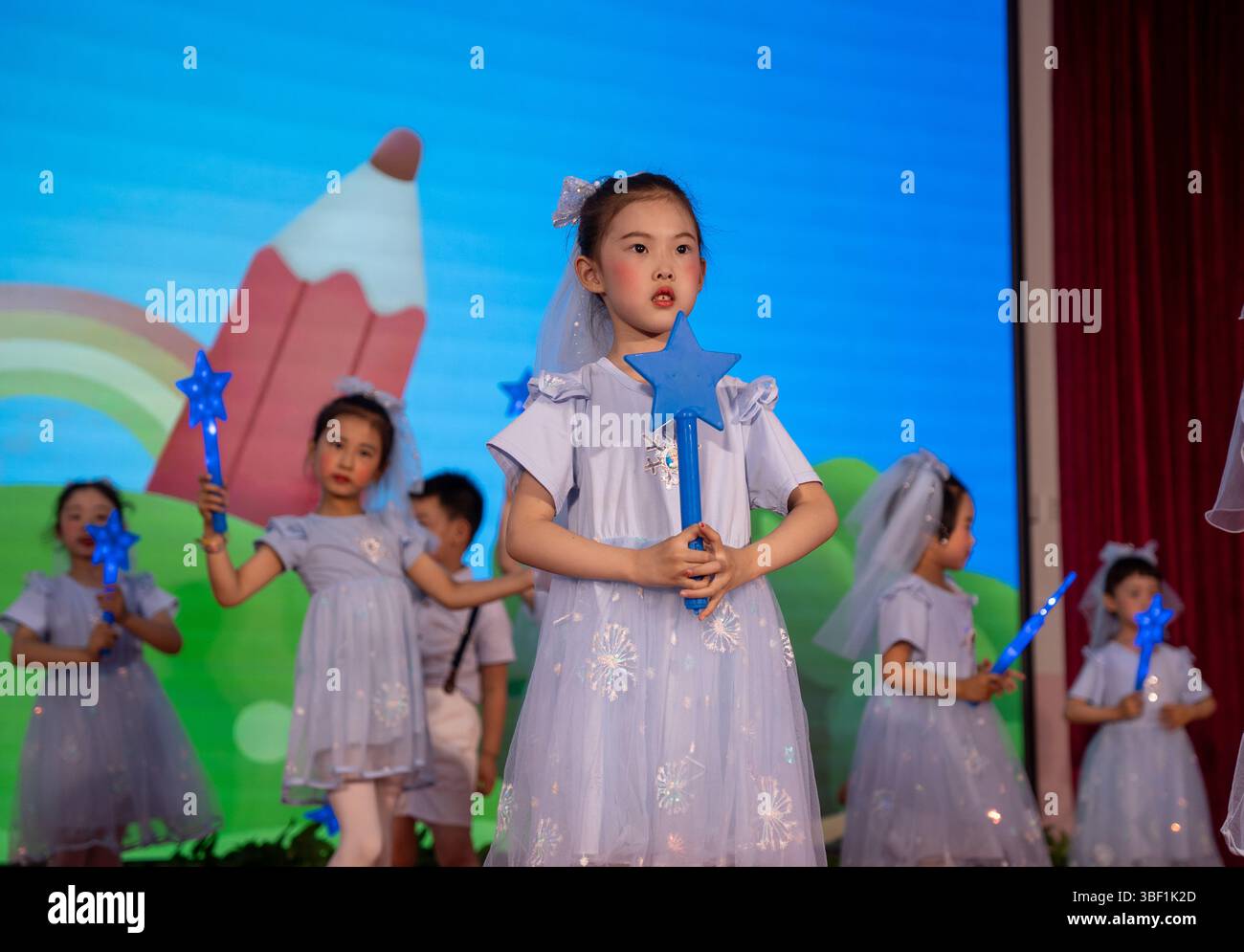 Beijing, China. 30th May, 2025. Children perform ahead of the ...