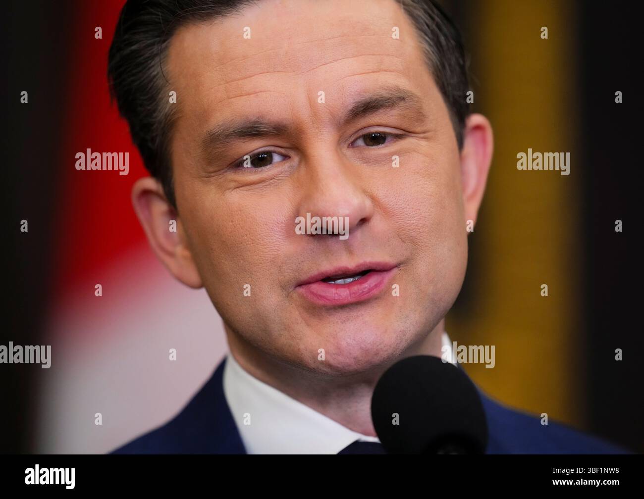 Conservative Leader Pierre Poilievre speaks to reporters in the foyer ...