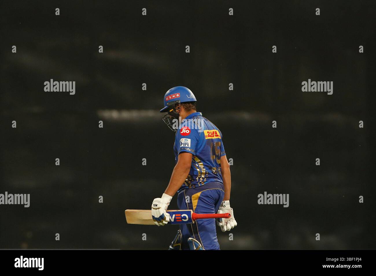 Mumbai Indians' Rohit Sharma walks off the field after losing his ...