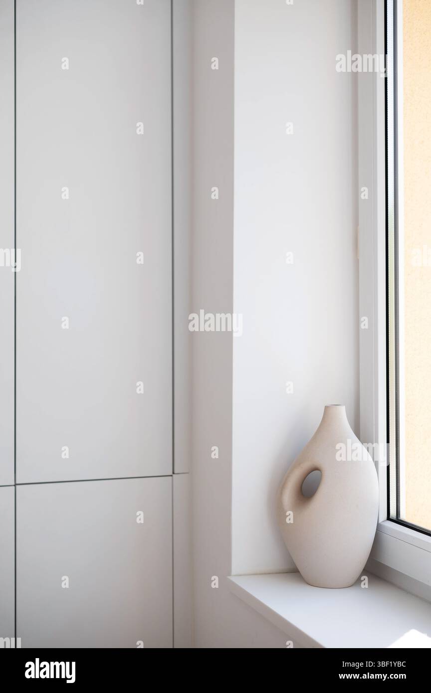 Modern Ceramic Vase on Minimalist Window Sill Stock Photo - Alamy