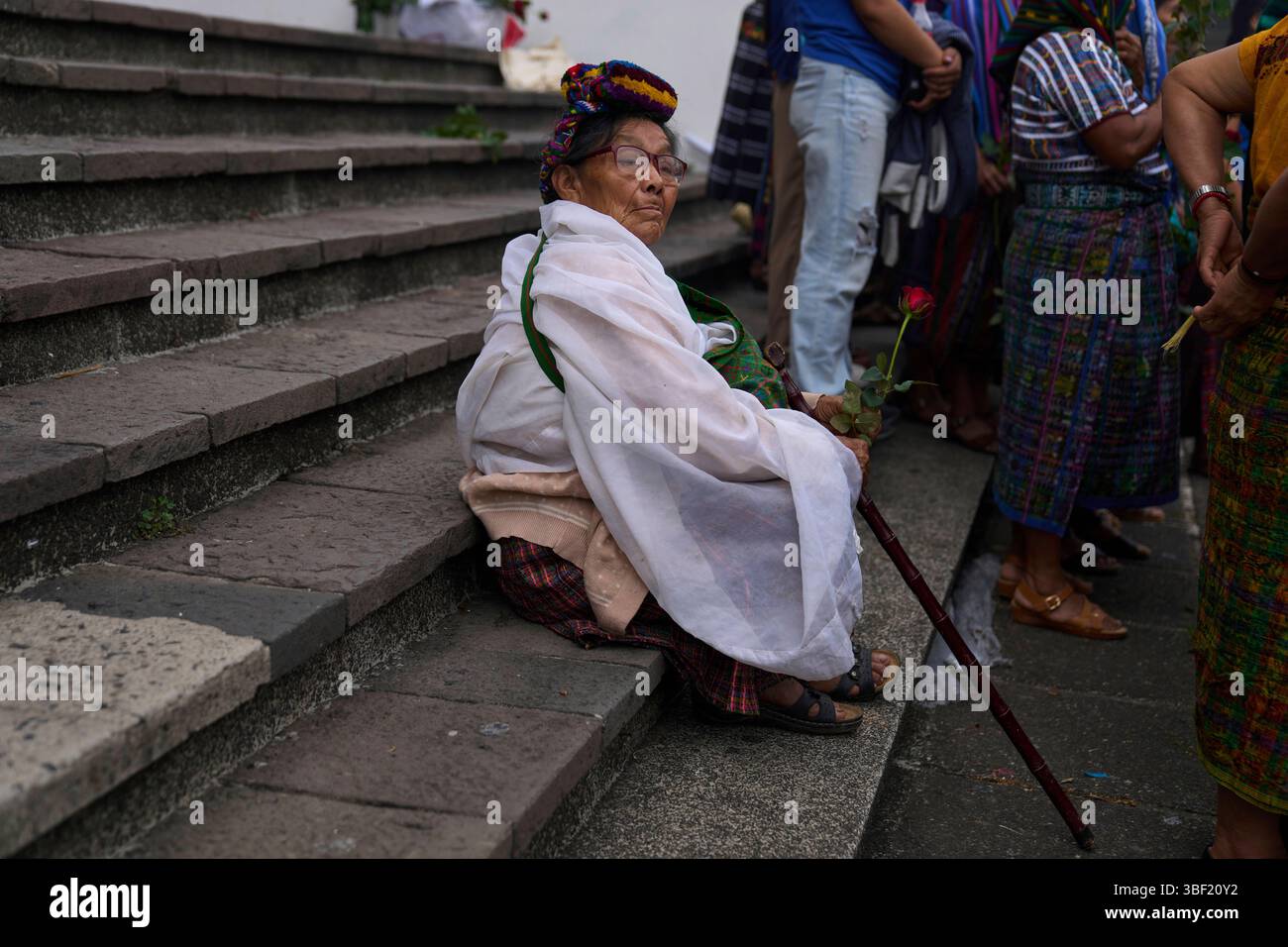 Indigenous woman Teresa Cacaj Cahuec waits outside the Supreme Court for an expected ruling, by ...
