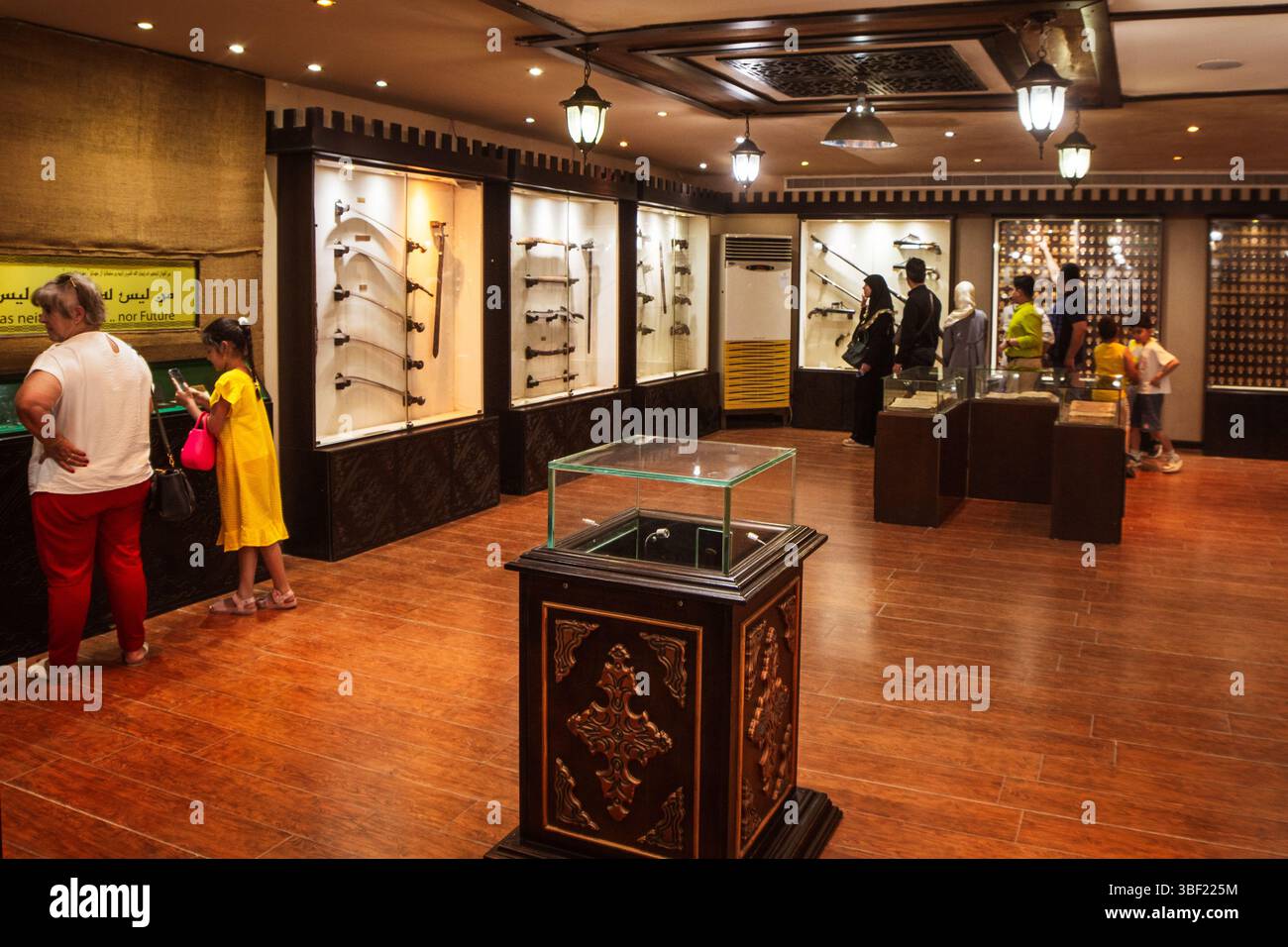Abu dhabi, UAE - 27th april, 2025: Visitors admire sword collection ...