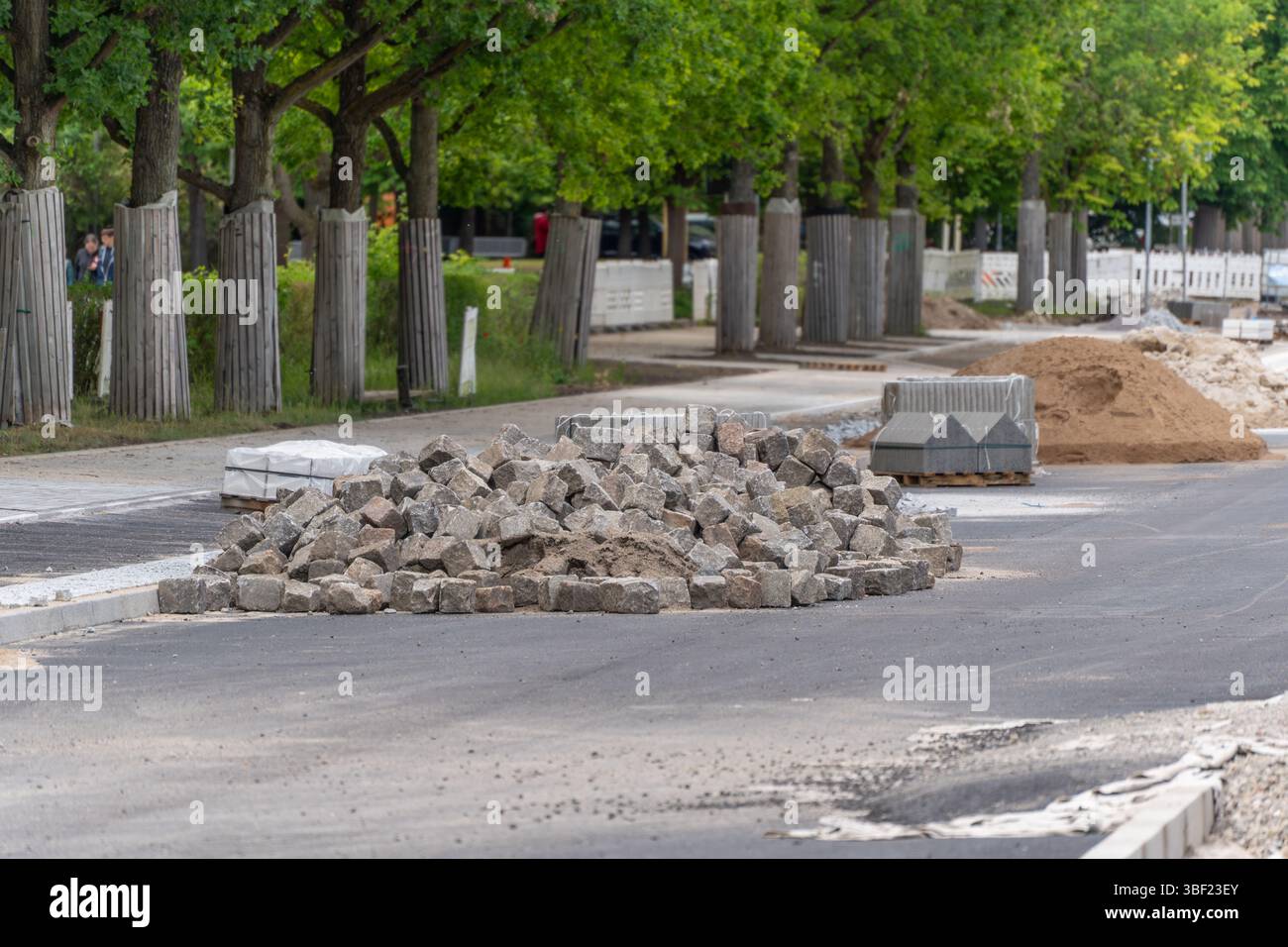 Construction site material with paving stones and sand. A pile of ...