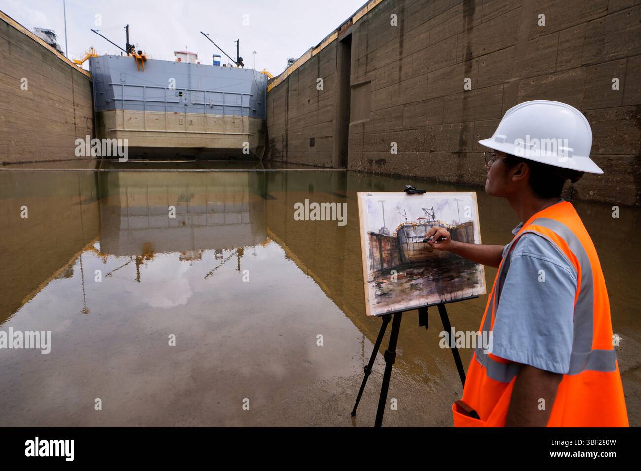 Architect Franz Delgado sketches a temporary bulkgate used to block ...