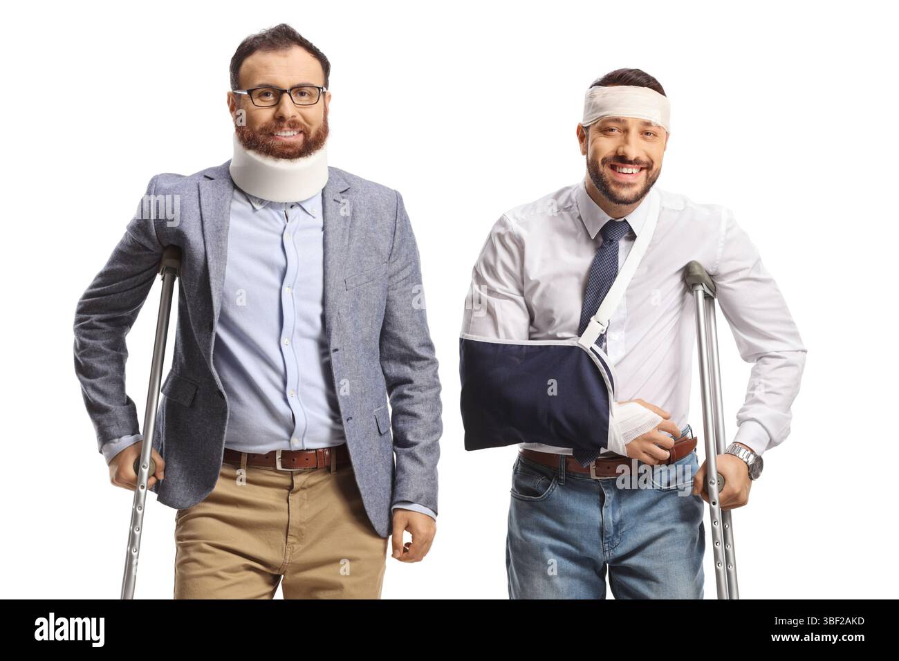 Two young injured men standing with crutches isolated on white ...