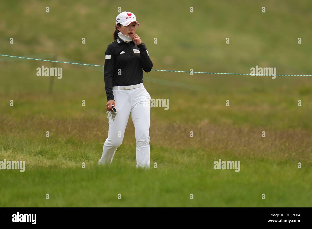 Youmin Hwang, of South Korea, walks to the 12th hole during the second round of the U.S. Women's ...