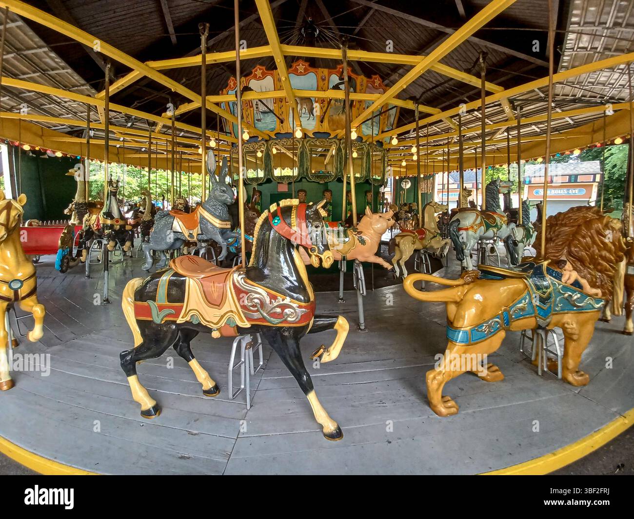 Toronto, ON, Canada – August 08, 2024: A classic carousel with colorful ...