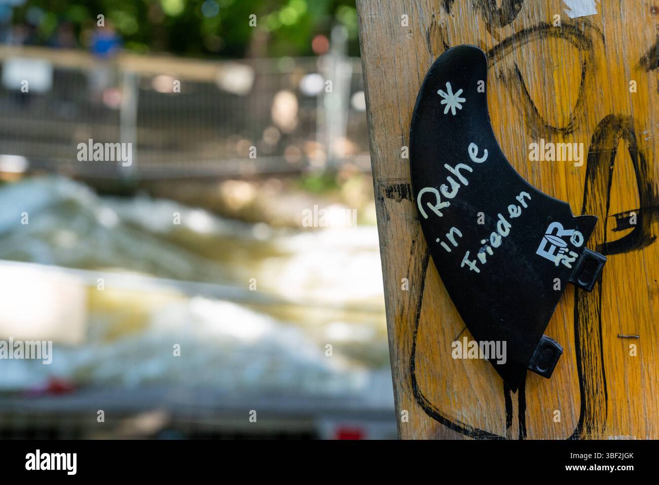 Munich, Bavaria, Germany - May 30, 2025: The Eisbach wave in Munich is ...