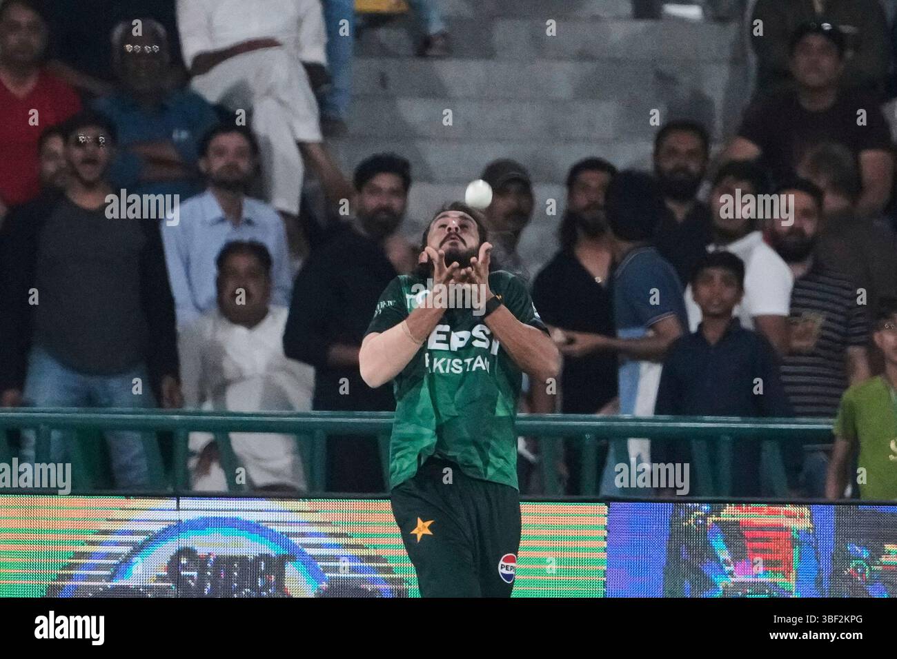 Pakistan's Hasan Ali takes a catch to dismiss Bangladesh's Parvez ...