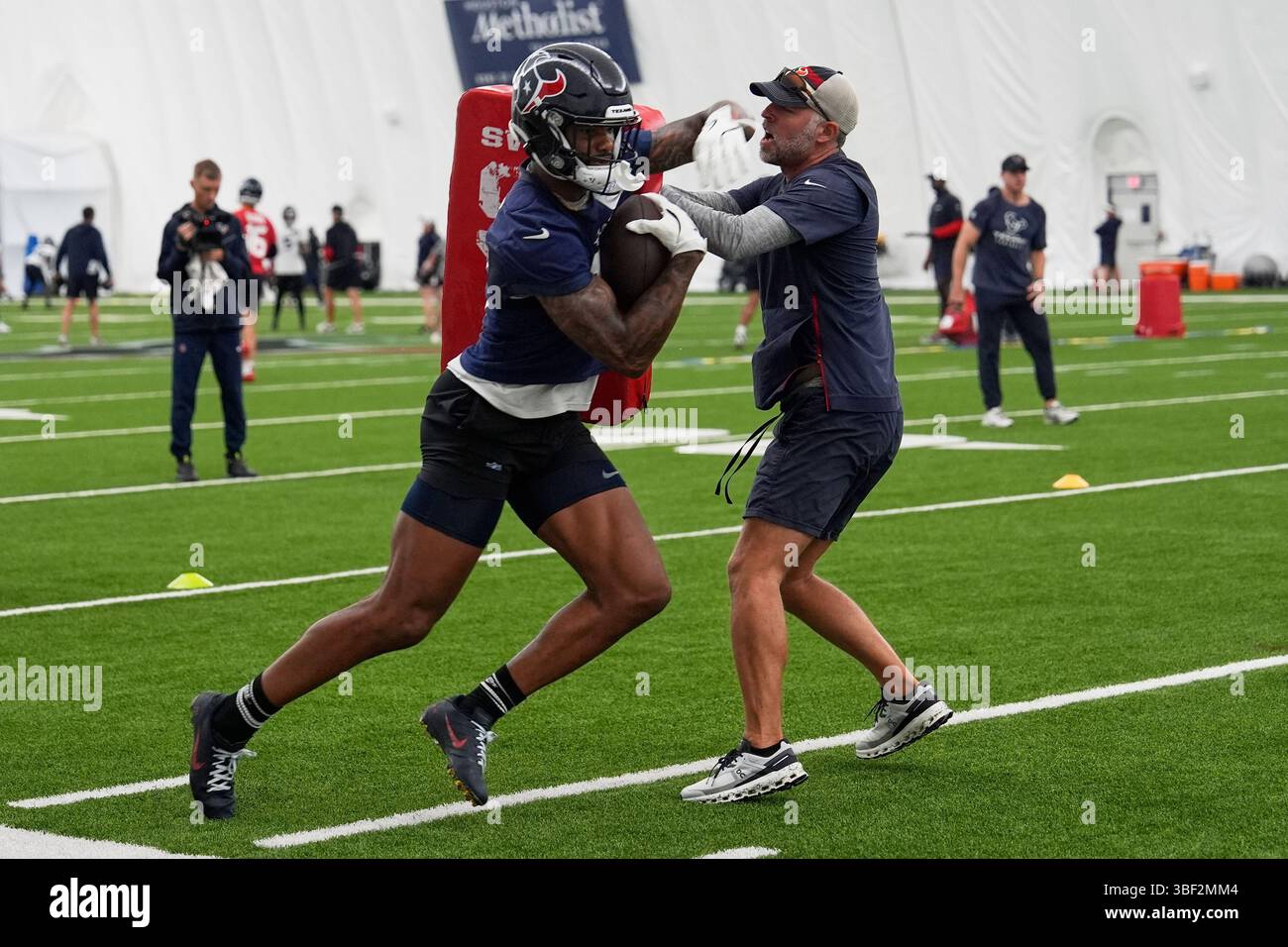 Houston Texans wide receiver Nico Collins (12) works out during NFL ...