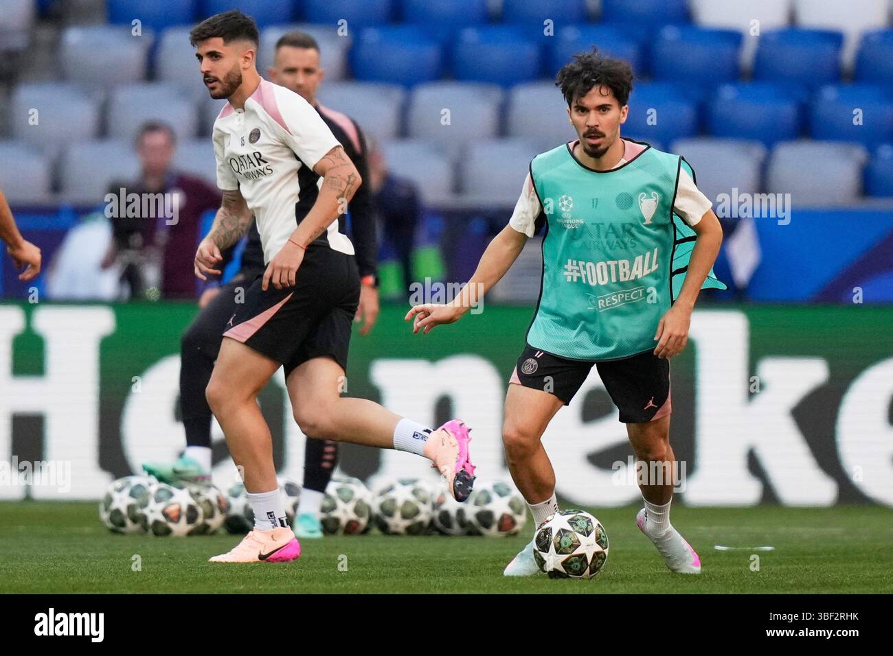 PSG's Vitinha passes the ball during a training session ahead of the ...