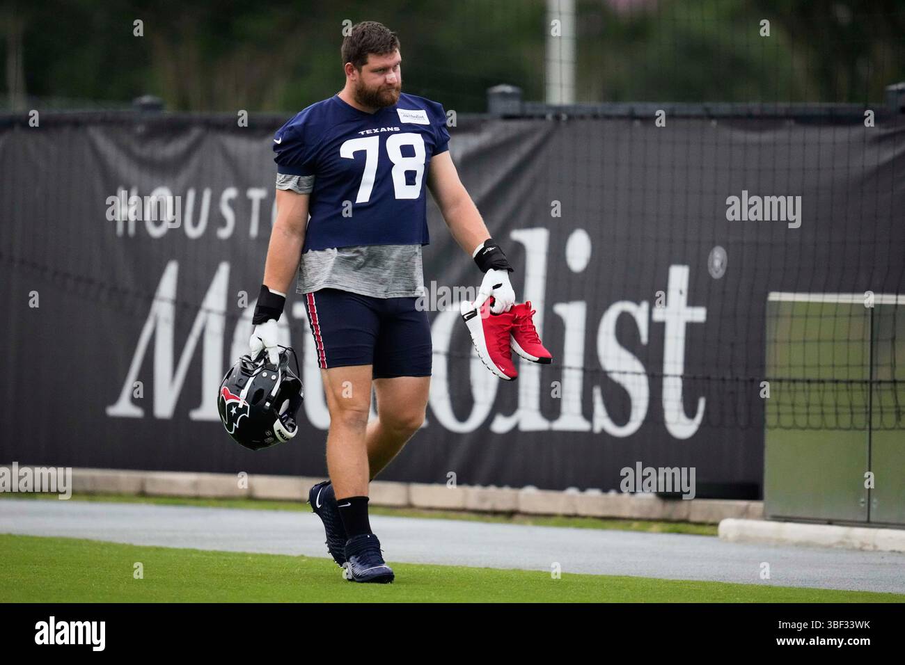 Houston Texans' Zach Thomas walks to a practice field during NFL ...