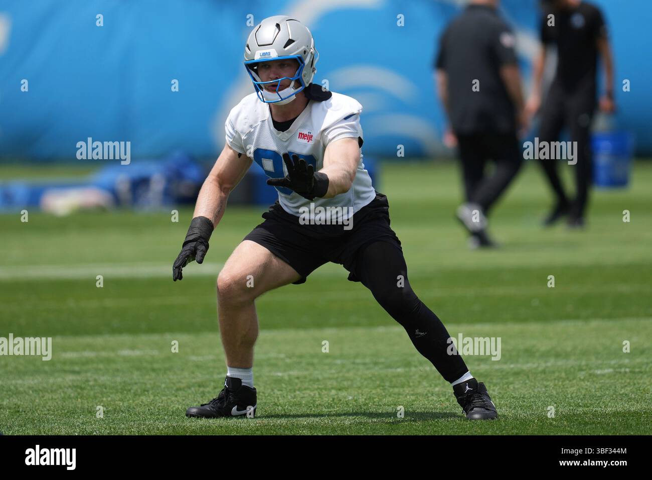 Detroit Lions defensive end Aidan Hutchinson runs a drill during an NFL ...