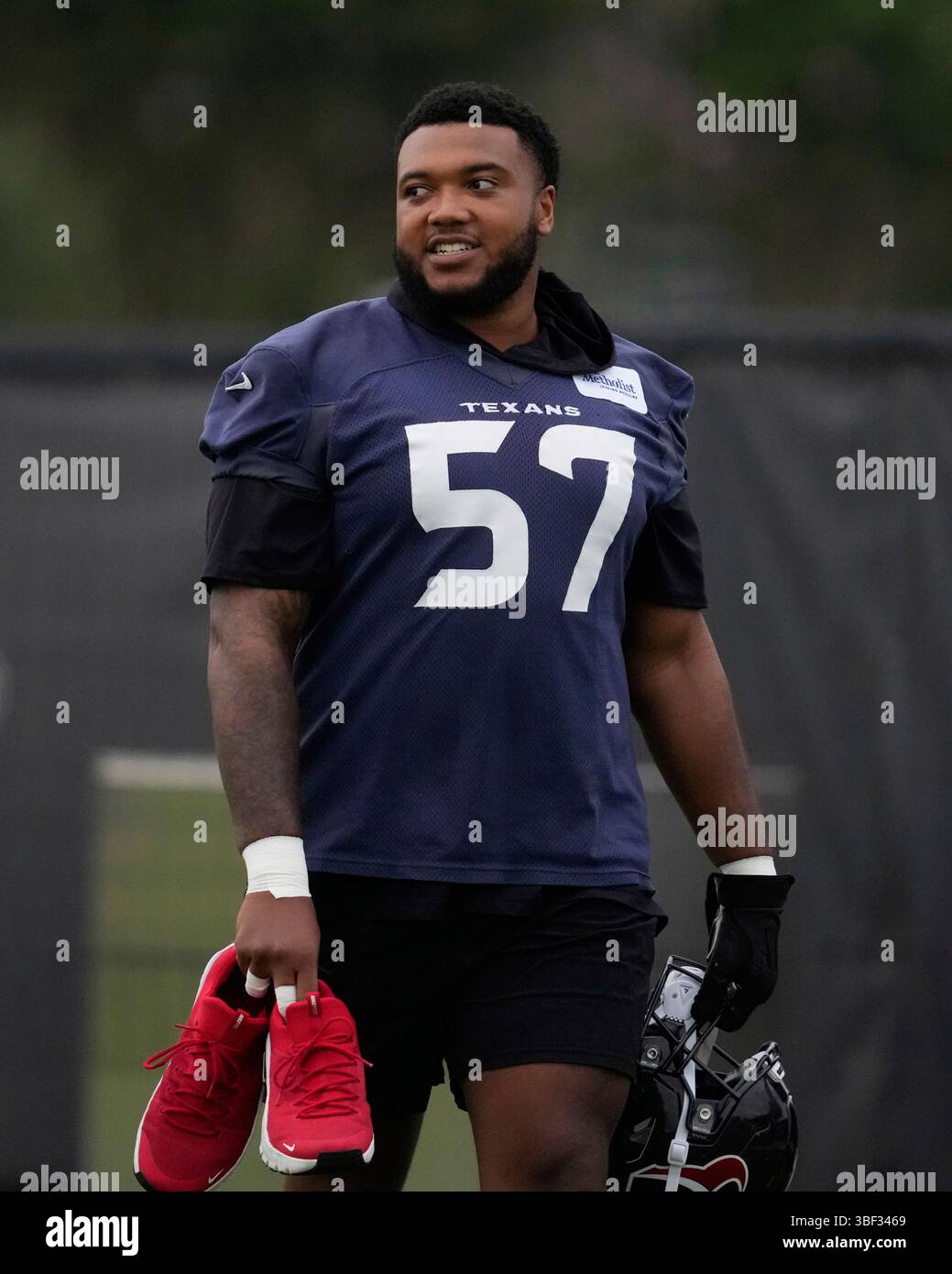 Houston Texans offensive tackle Blake Fisher walks to a practice field ...