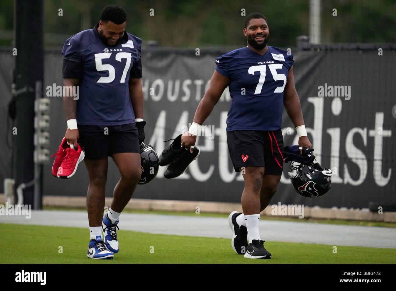 Houston Texans offensive tackle Blake Fisher (57) and offensive tackle ...