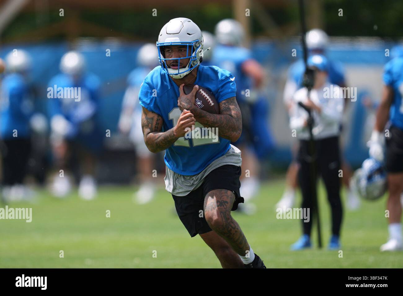 Detroit Lions wide receiver Tim Patrick runs after a catch during an ...
