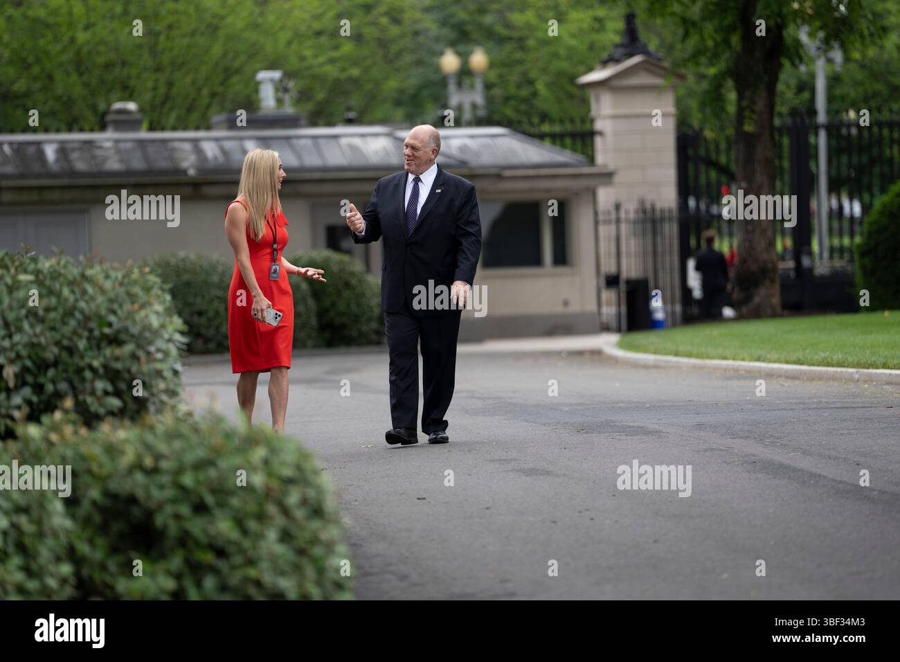White House Border Czar Tom Homan speaks with a staff member after ...