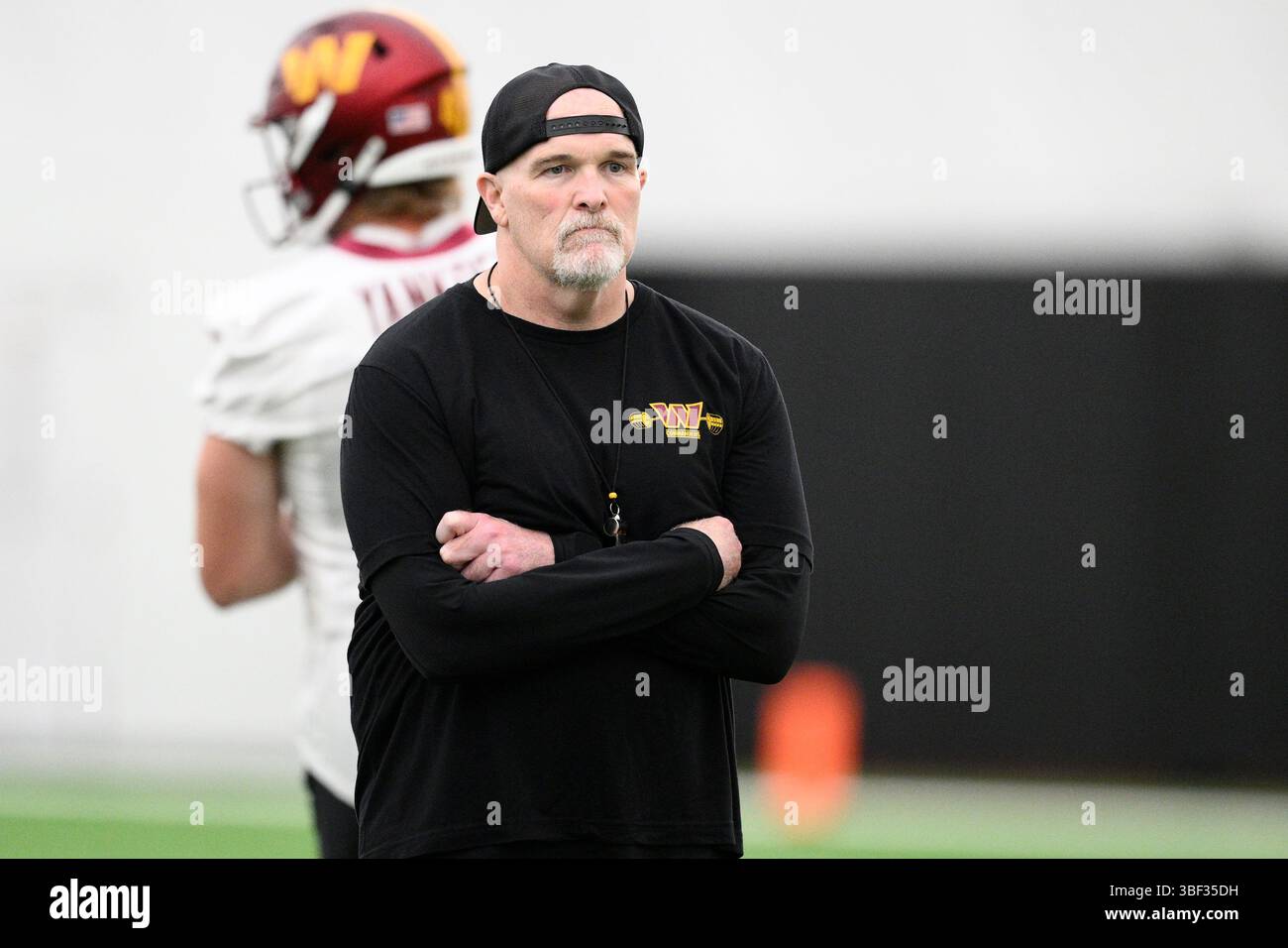 Washington Commanders head coach Dan Quinn looks on during NFL football ...