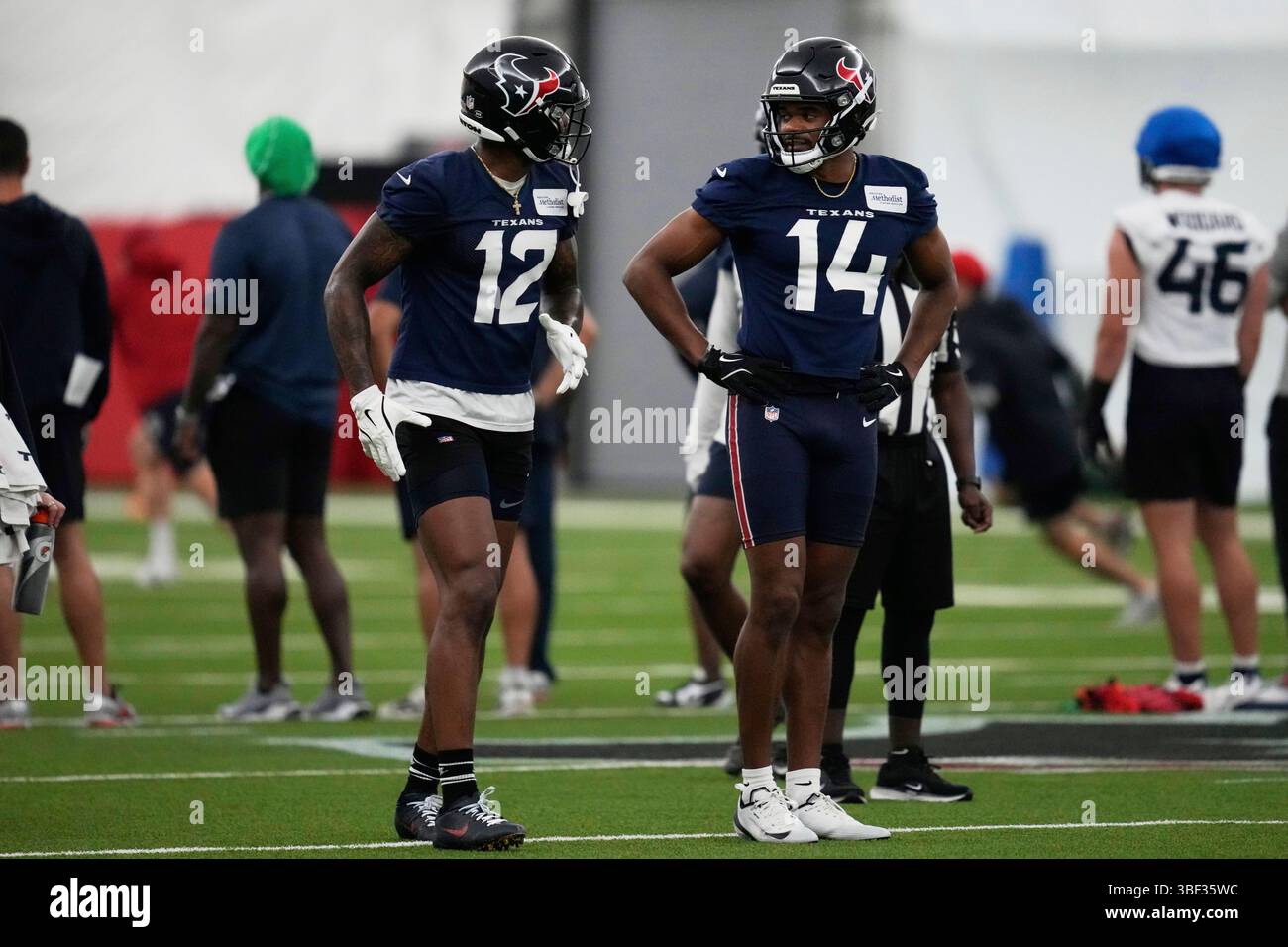 Houston Texans wide receiver Nico Collins (12) and wide receiver Jared ...