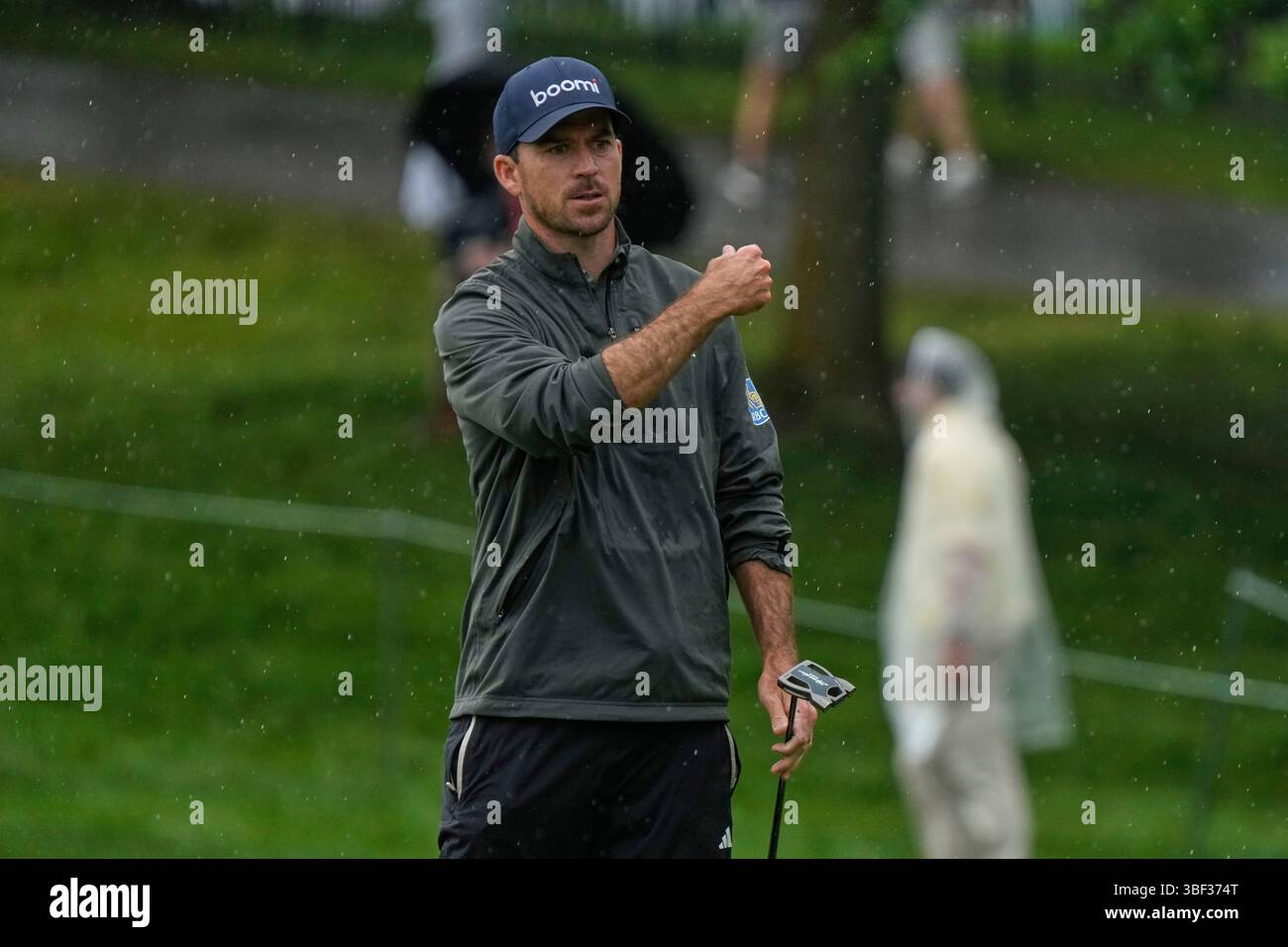 Nick Taylor gestures after his putt on the seventh green during the ...