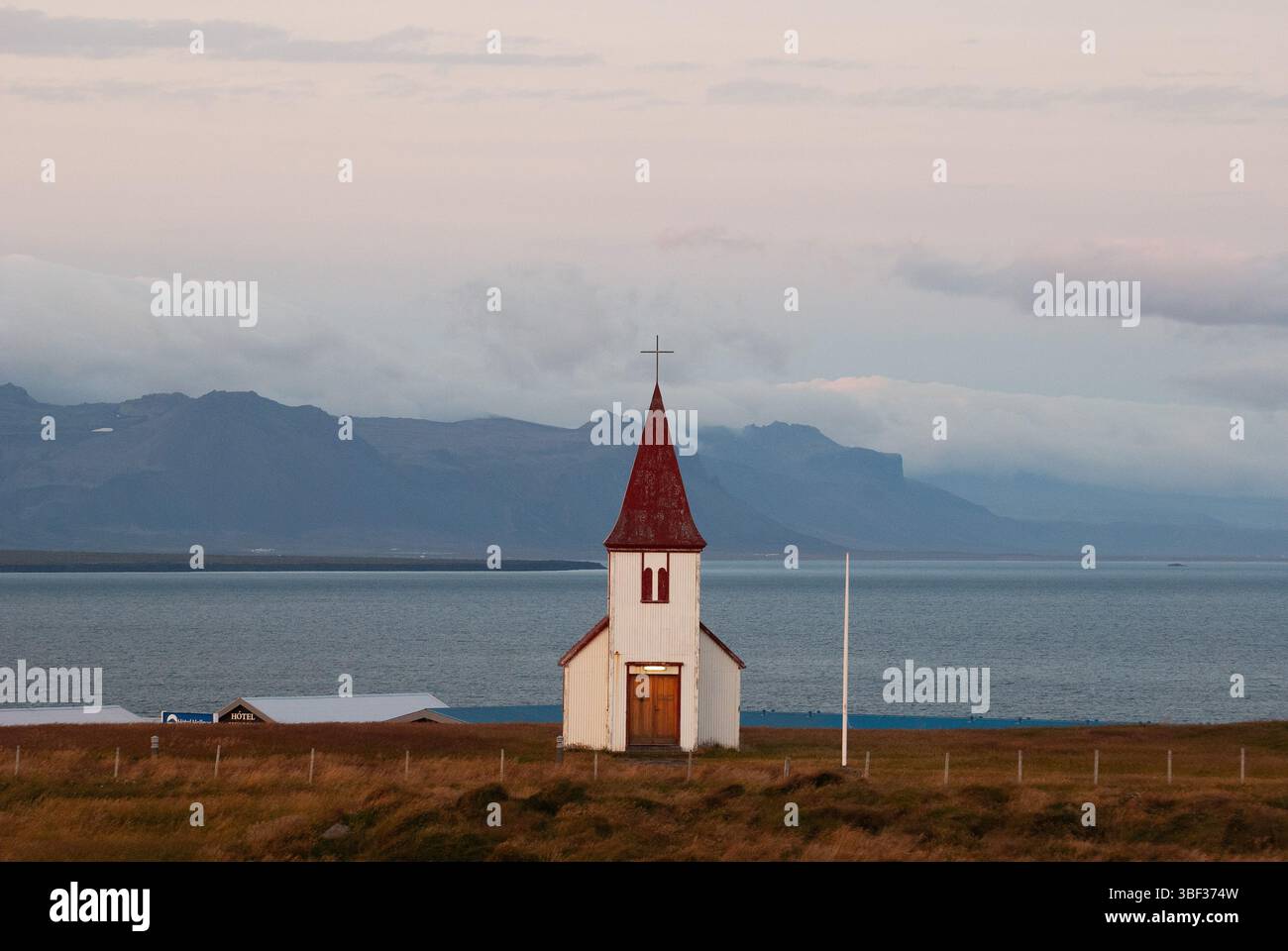 Hellnar Church stands quietly on the Snæfellsnes Peninsula, surrounded ...