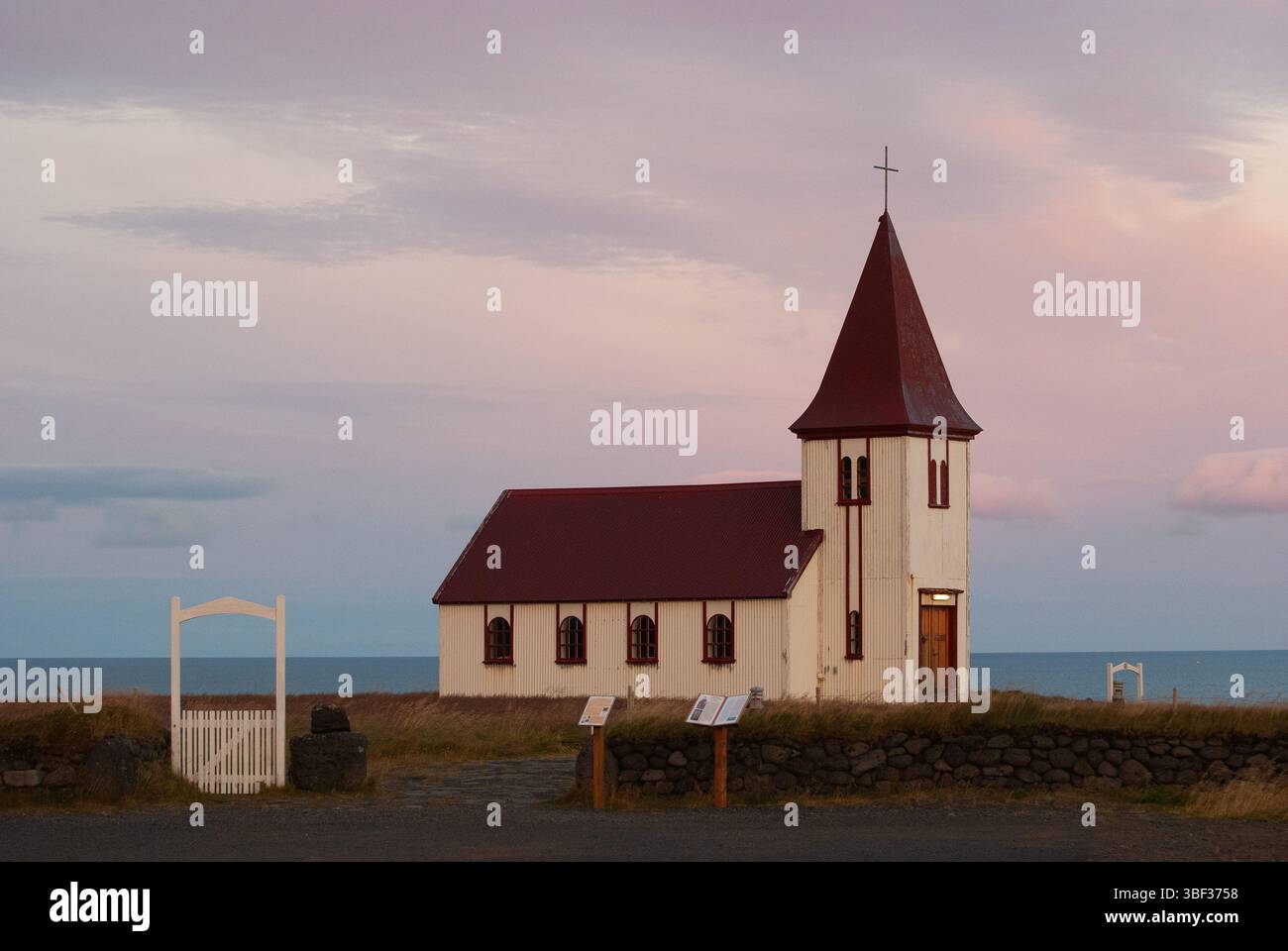 Hellnar Church stands quietly on the Snæfellsnes Peninsula, surrounded ...