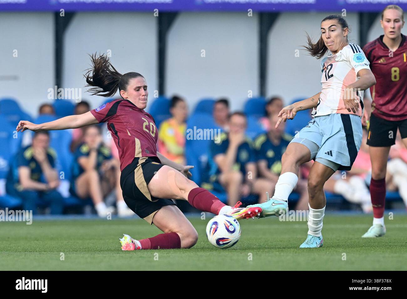 Marie Detruyer (20) of Belgium fighting for the ball with Patri ...