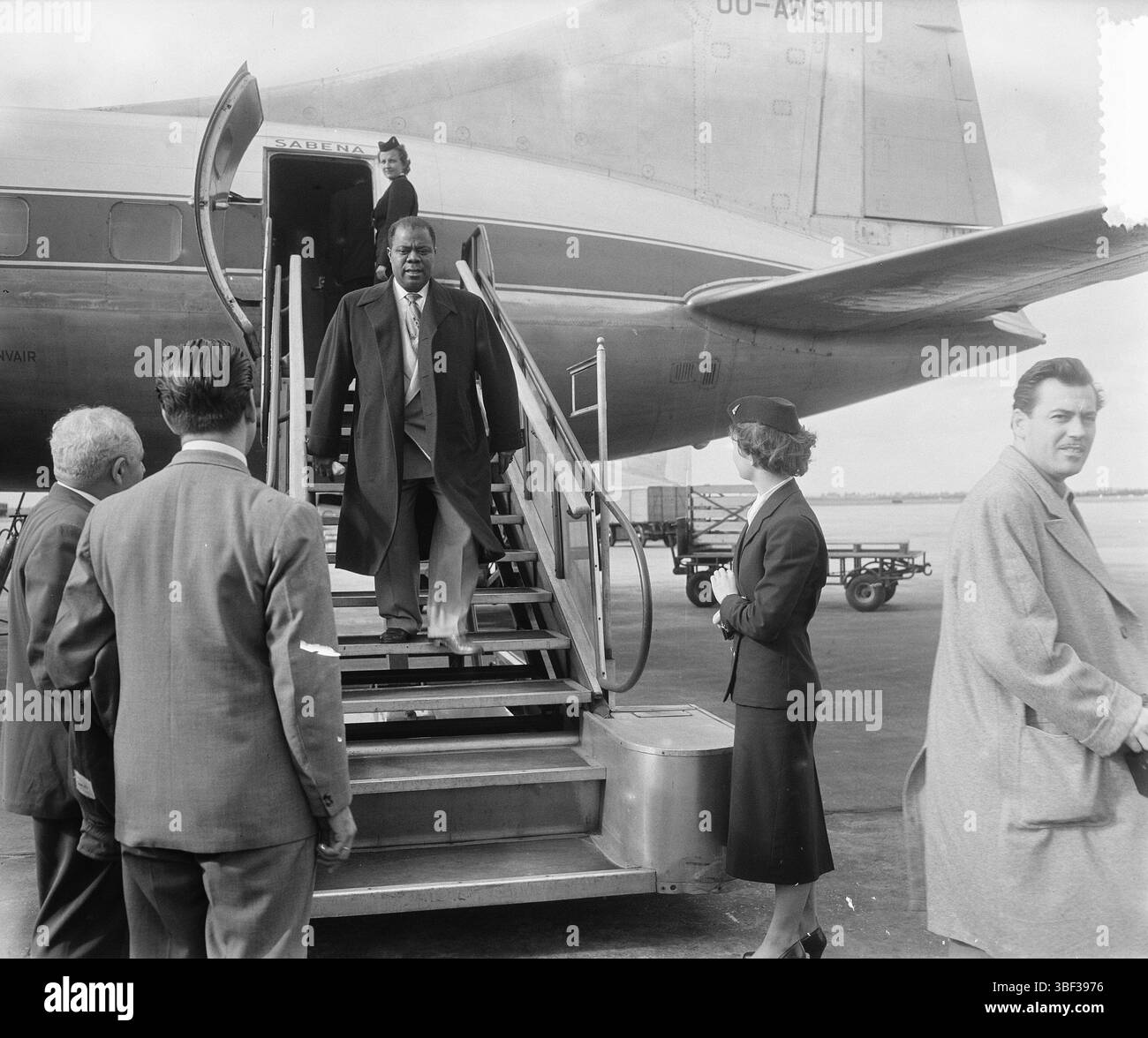 Louis Armstrong descending from his plane at Schiphol Airport on 8th ...