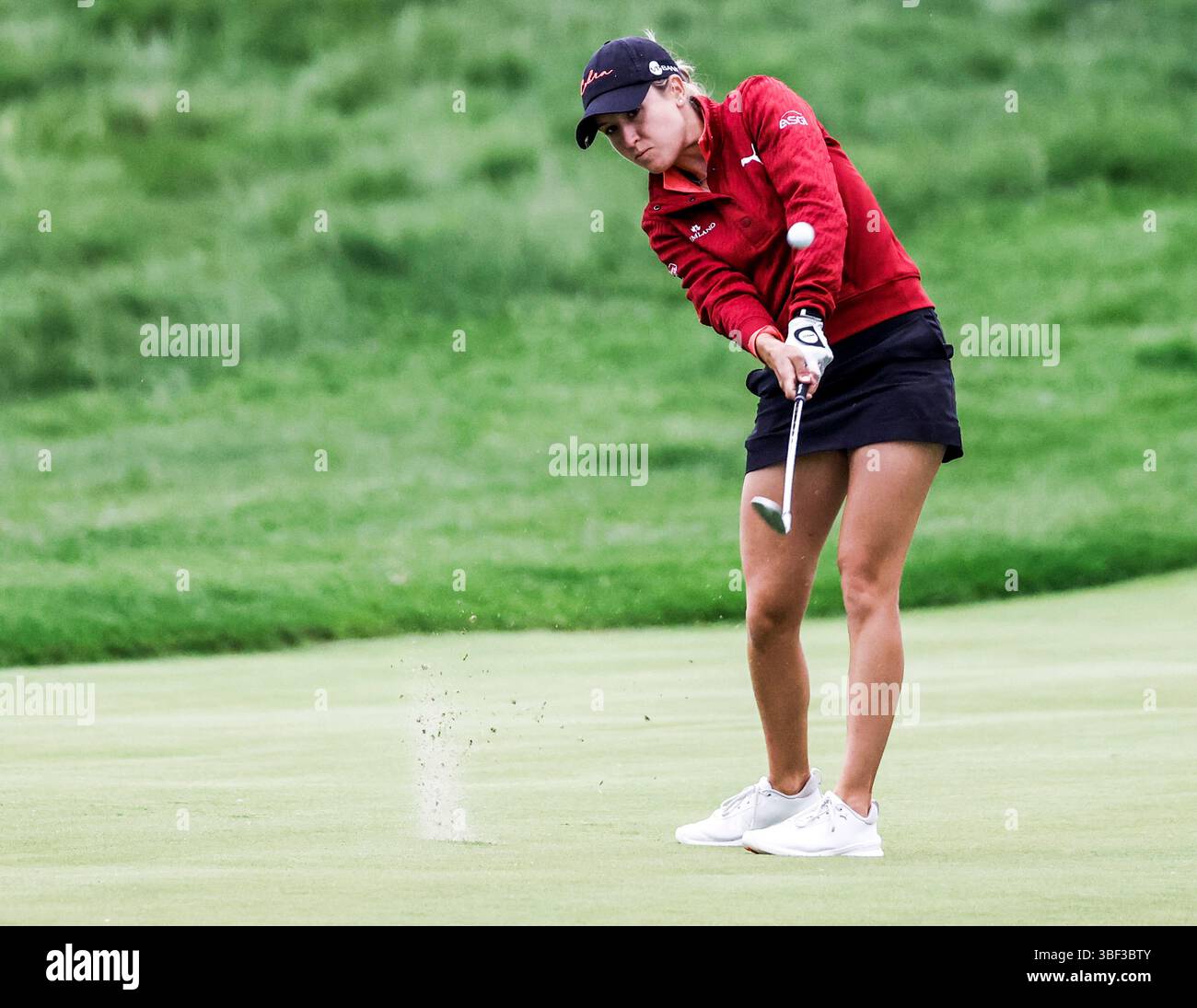 Chiara Tamburlini of Switzerland hits her approach shot on the 18th ...