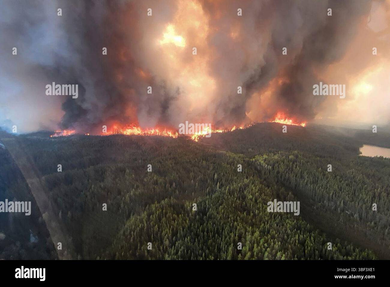 This photo provided by the Manitoba government shows wildfires in ...