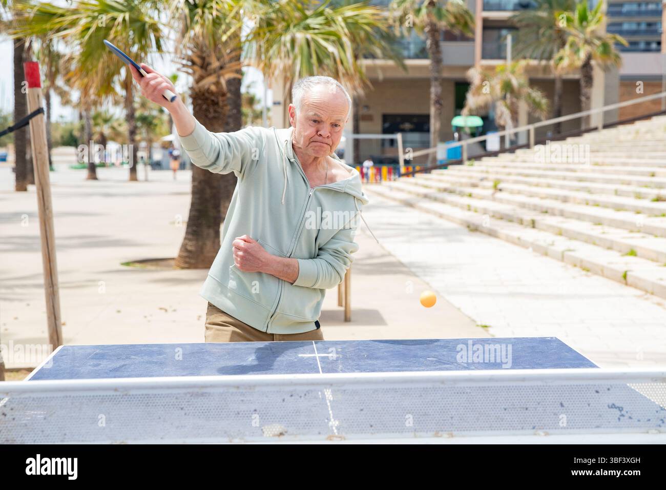Sportsman playing tennis on indoor hi-res stock photography and images ...