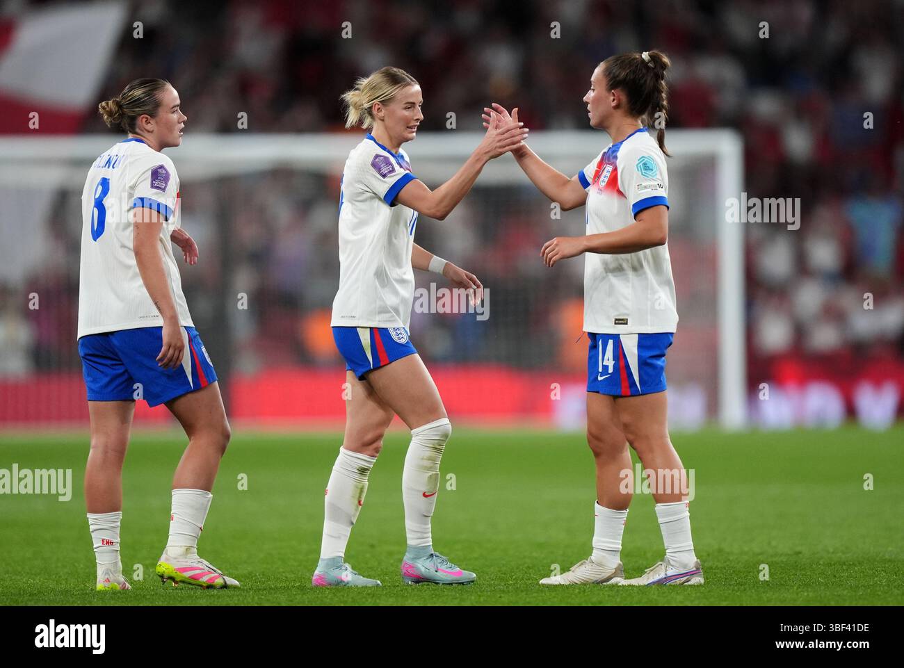 England's Grace Clinton, Chloe Kelly and Maya Le Tissier (left to right) celebrate the win after ...