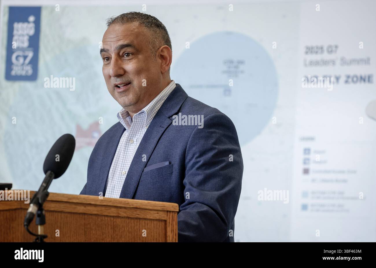 Sgt. Mark Basanta, RCMP Protective Operations, announces the Integrated ...