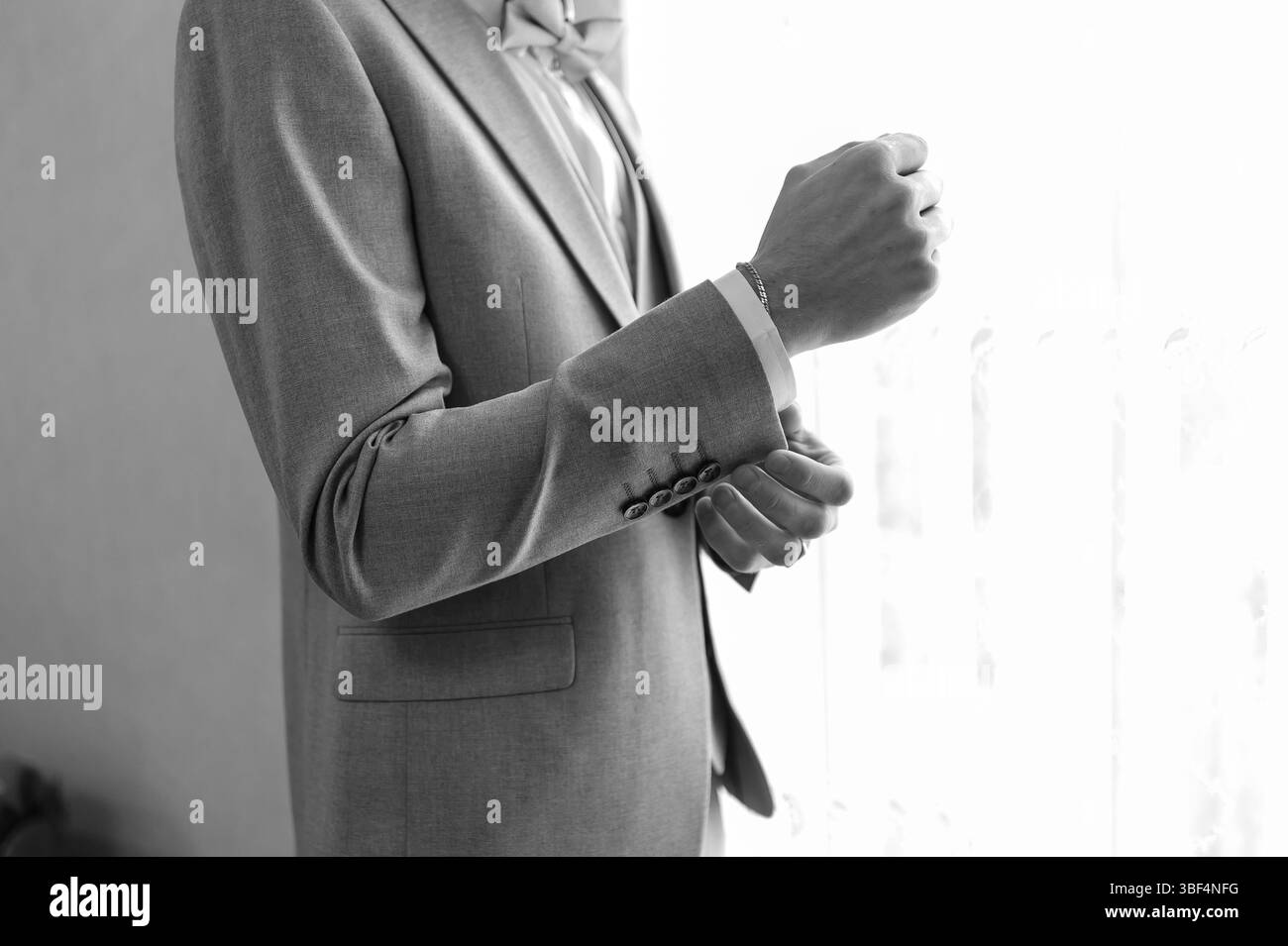 Grey suit Black and White Stock Photos & Images - Alamy