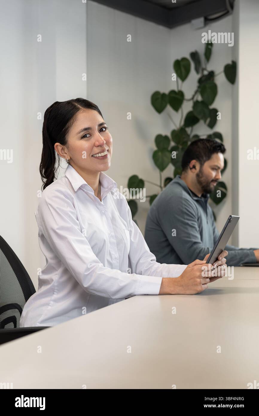 Friendly coworkers smiling together shared hi-res stock photography and ...