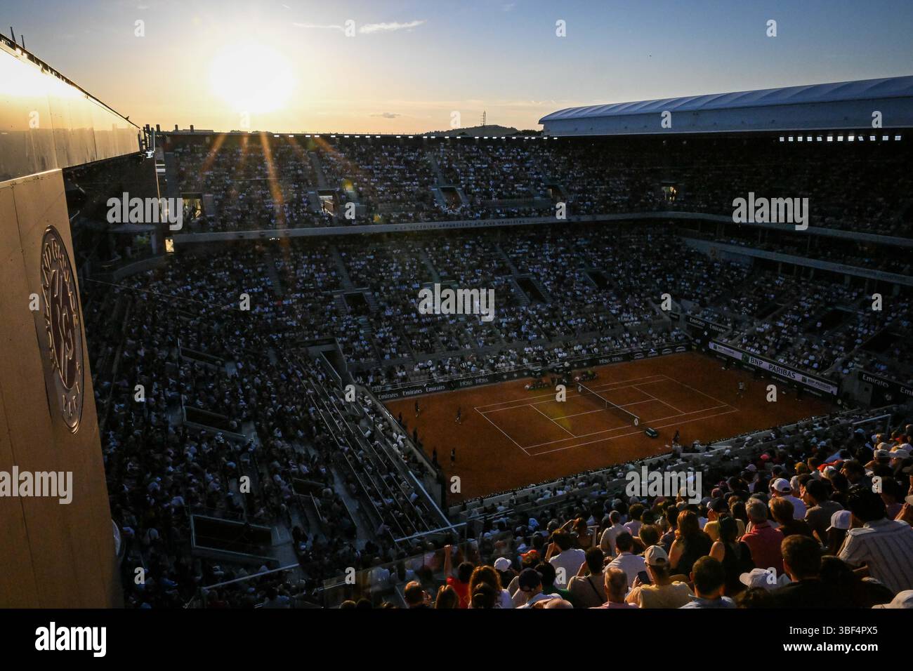 General view of Court Philippe Chatrier with a sunset during the sixth ...