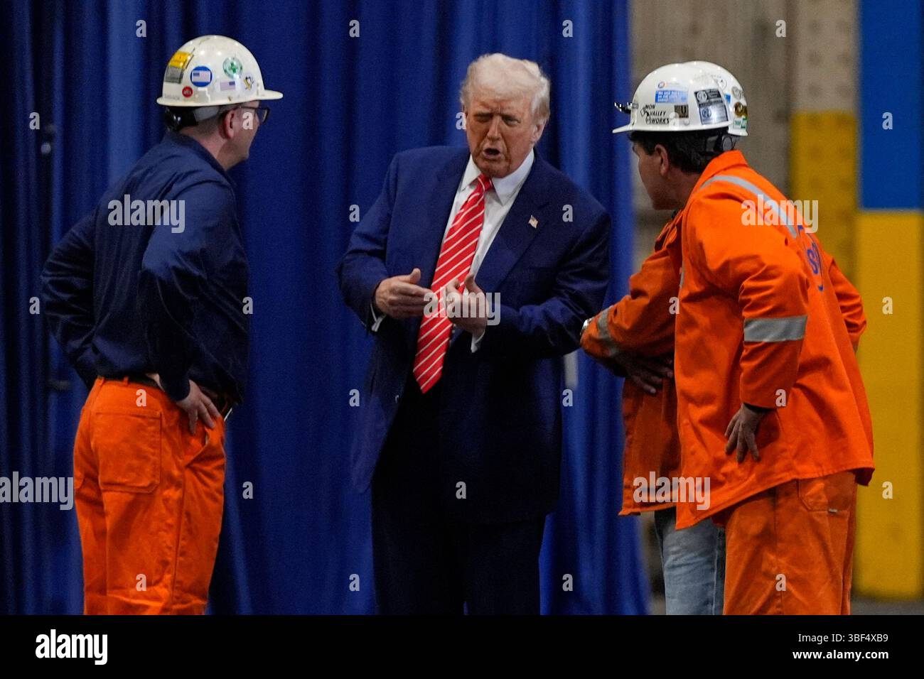 President Donald Trump talks to workers as he tours U.S. Steel ...