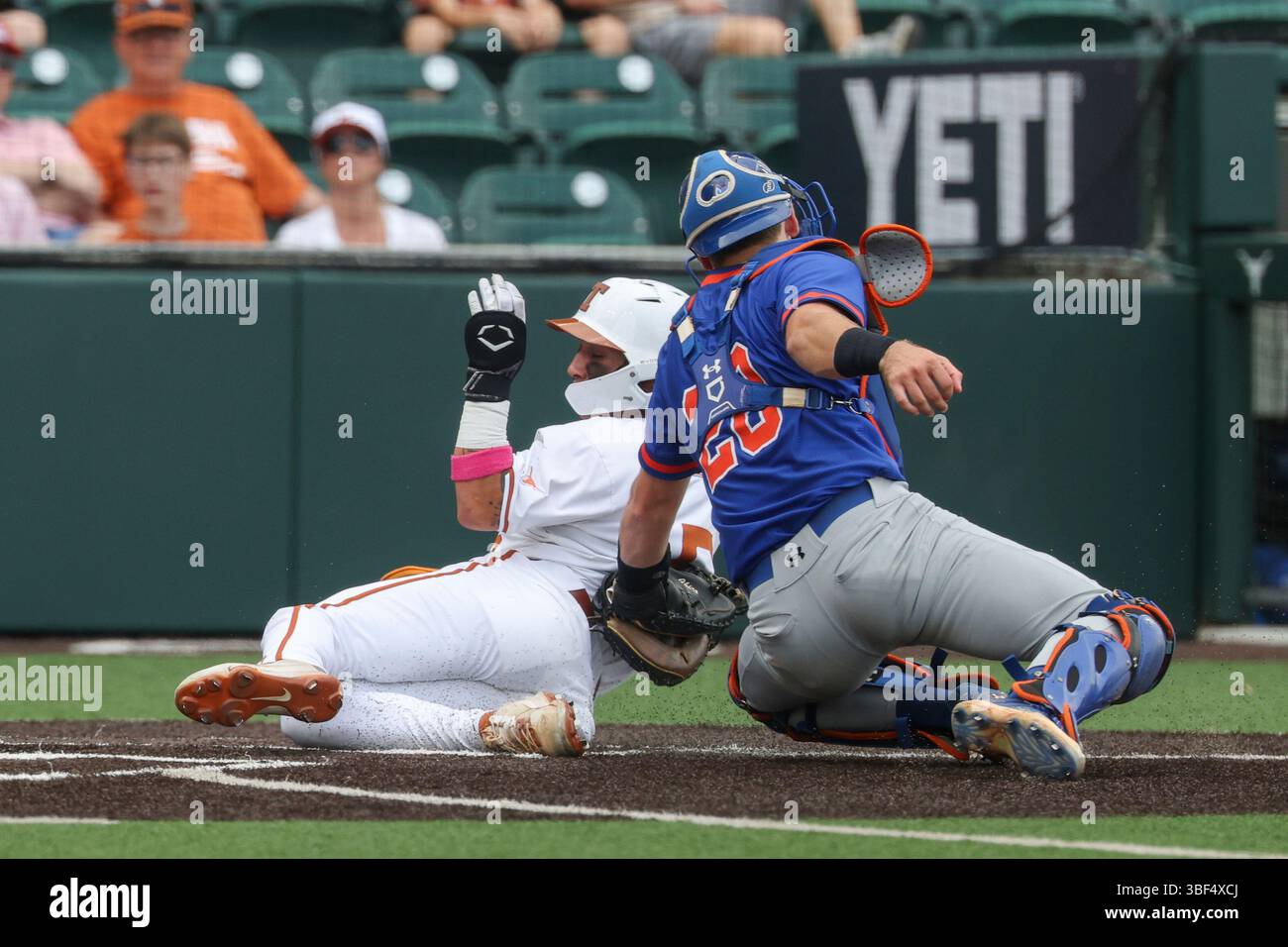 AUSTIN, TX - MAY 30: Houston Christian catcher Luke Bard (28) tags ...